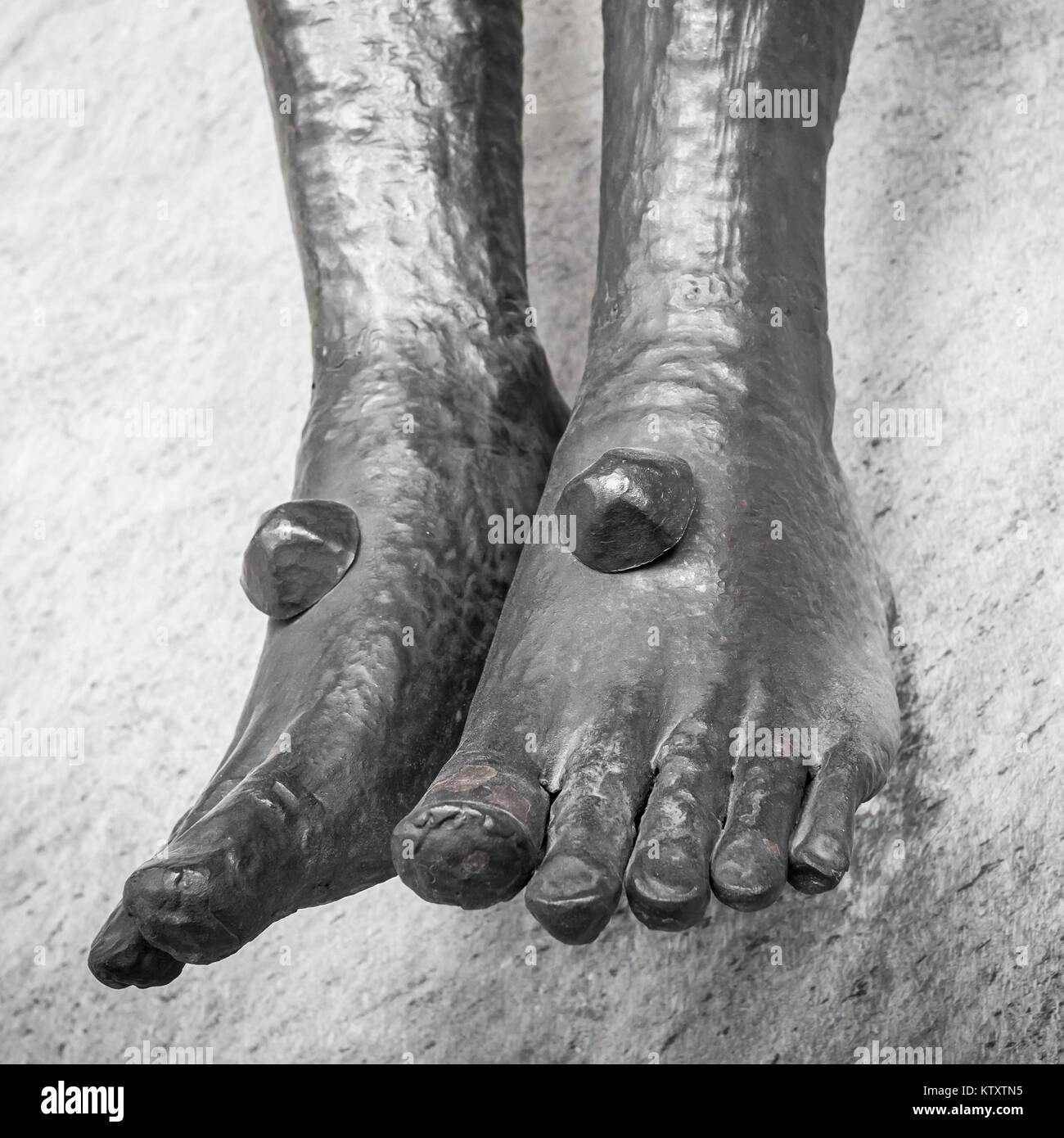Nailed feet , detail of statue of Jesus Christ crucified Stock Photo - Alamy