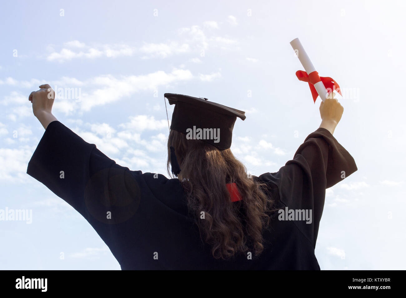 New college graduate holding her diploma hi-res stock photography and ...