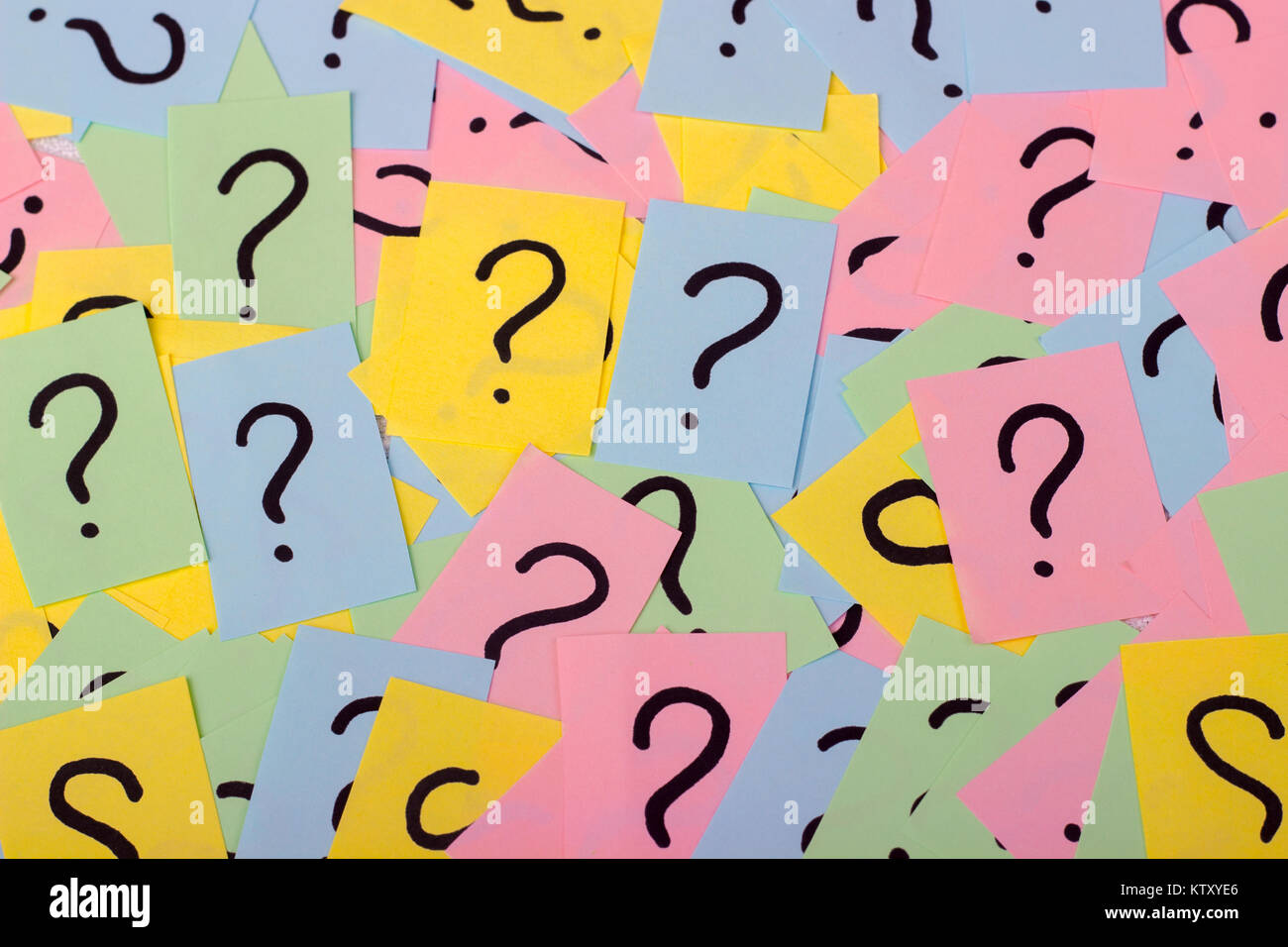 Too Many Questions. Pile of colorful paper notes with question marks ...