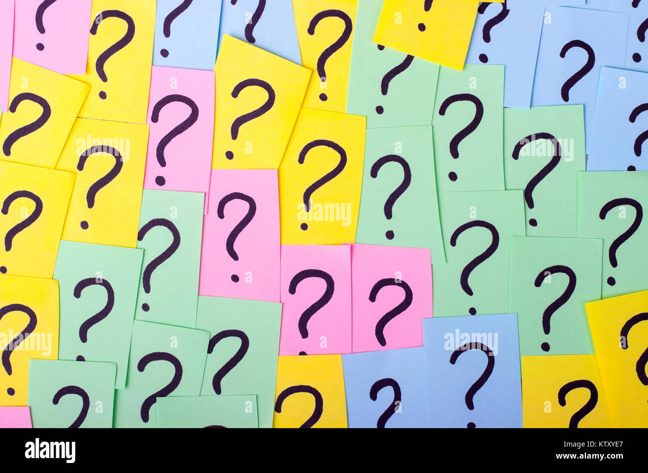 Too Many Questions. Pile of colorful paper notes with question marks ...