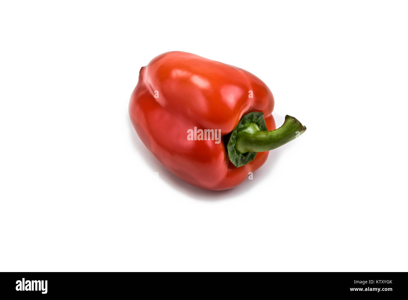 Whole red pepper on white background Stock Photo - Alamy