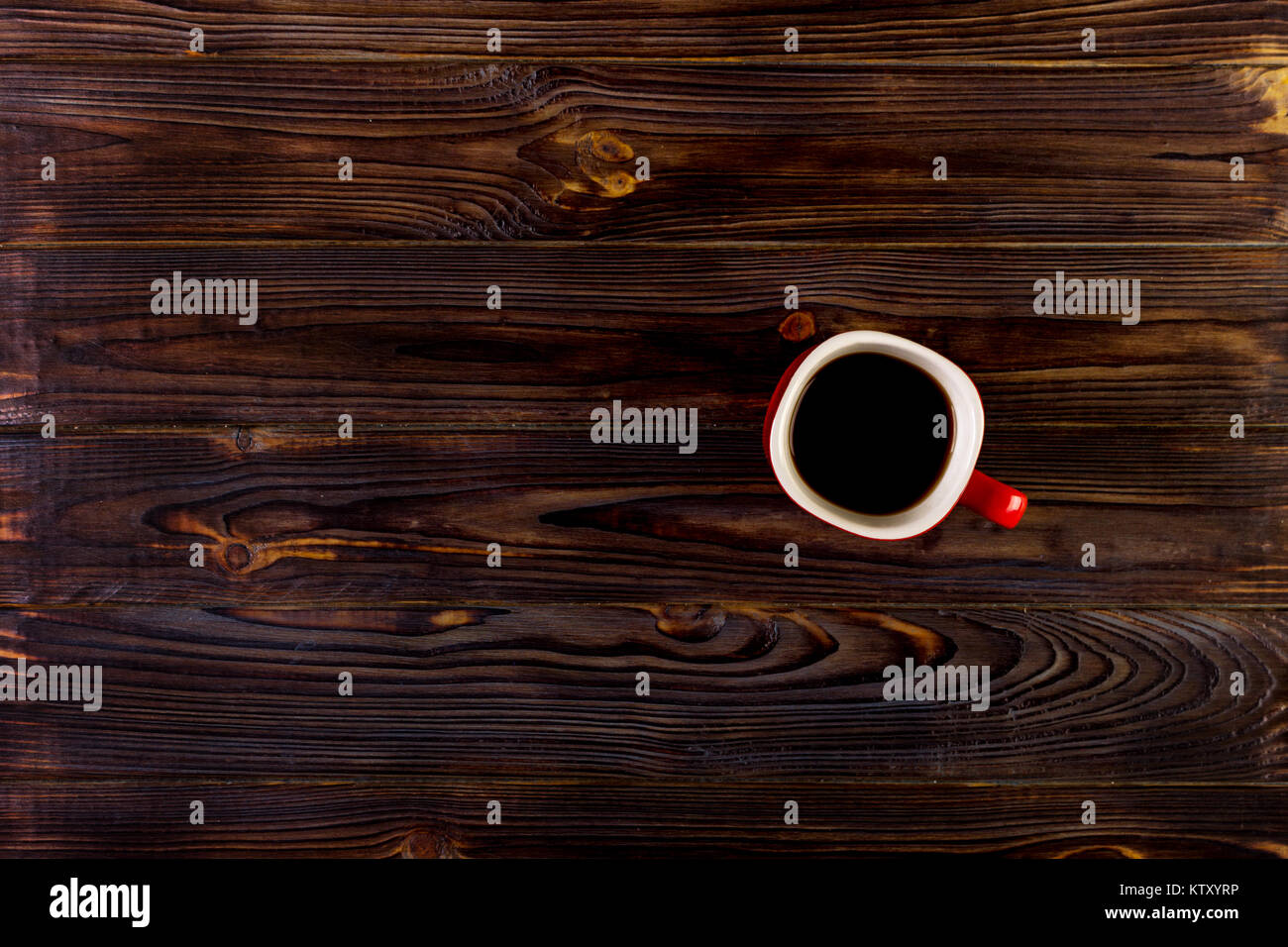 Cup of coffee on wooden table, top view Stock Photo - Alamy