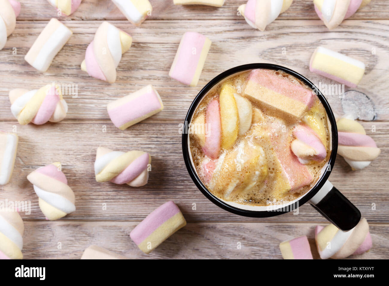 Coffee with marshmallows on white wood table Stock Photo - Alamy