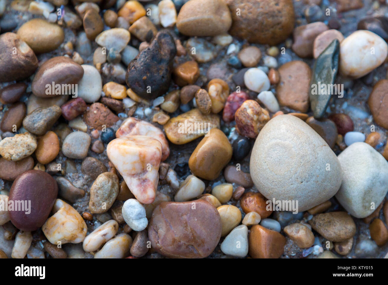 Different rocks scattered on Moana Beach in South Australia Stock Photo ...