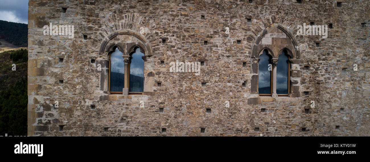 Medieval windows ("bifora" type) on the facade of a medieval tower in ...