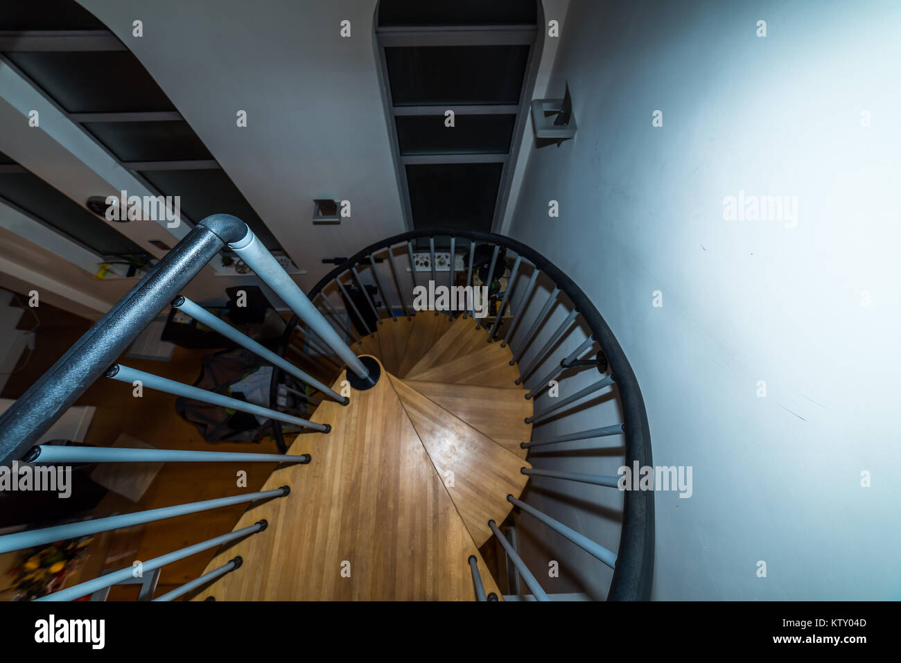 Overhead view spiral wooden steps going down indoor Stock Photo - Alamy