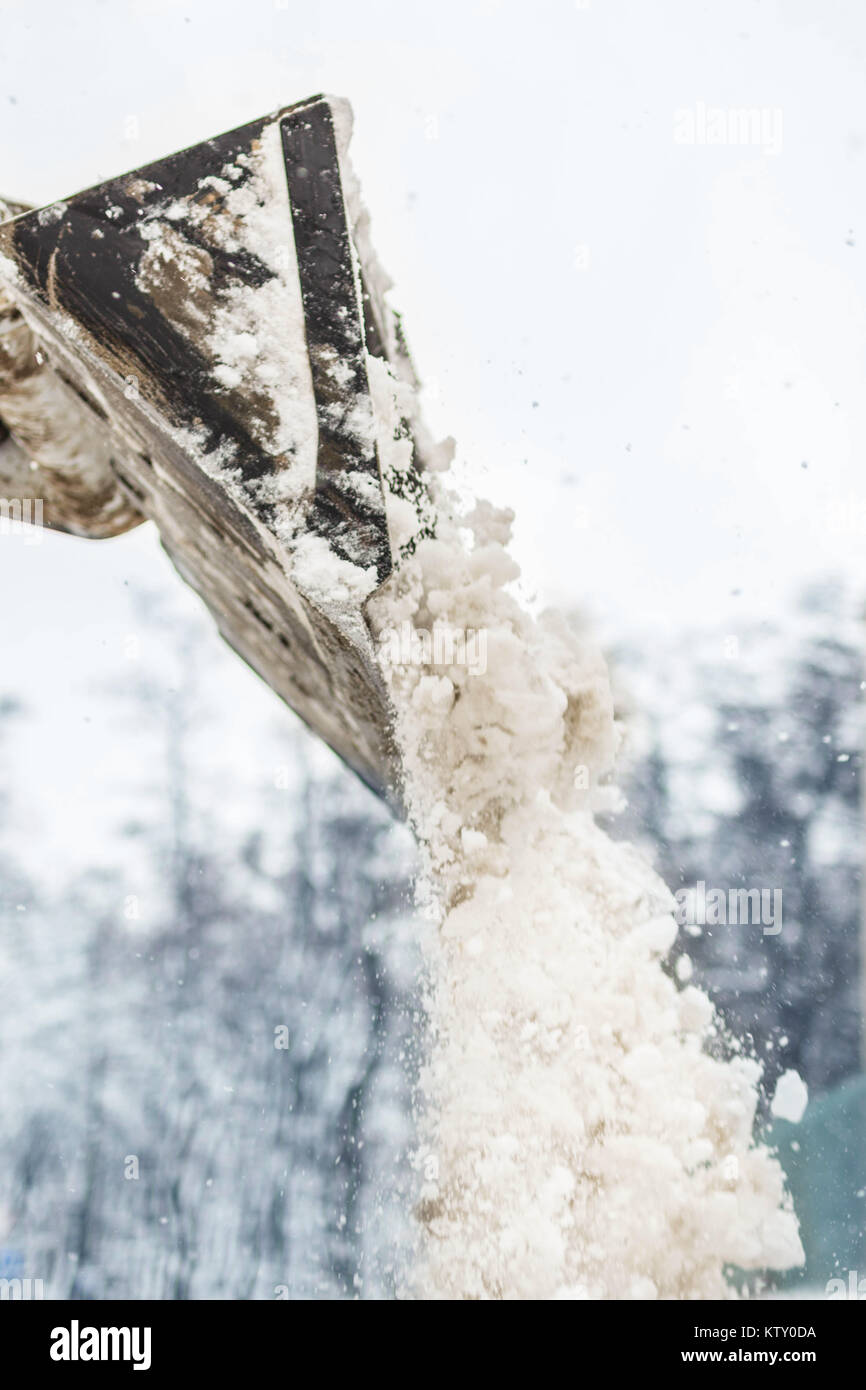 Machine remove snow from a city street Stock Photo - Alamy