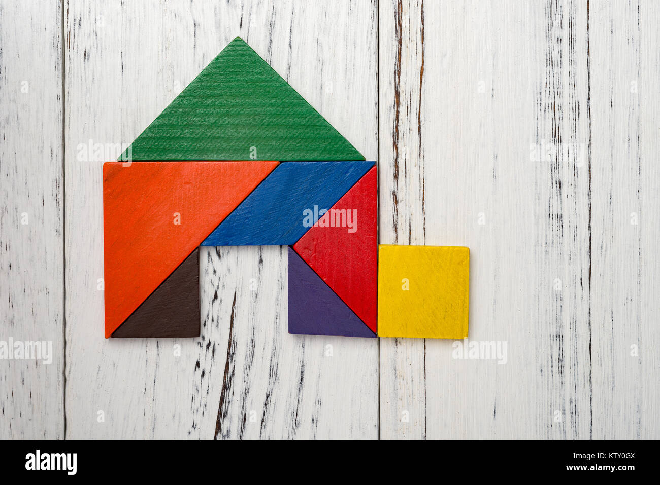 wooden tangram shaped like a house Stock Photo - Alamy