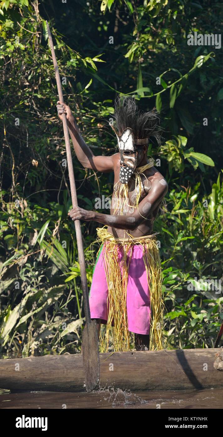 YOUW VILLAGE, ASMAT REGION, NEW GUINEA, INDONESIA - MAY 23, 2016: Canoe ...