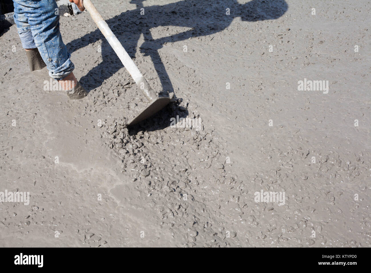 laborers made new construction of street and floor by cement concrete ...