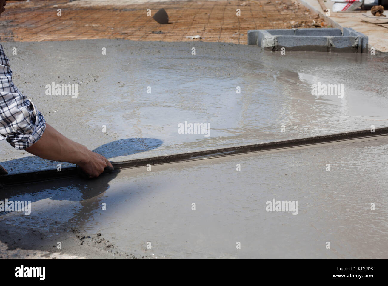 laborers made new construction of street and floor by cement concrete ...