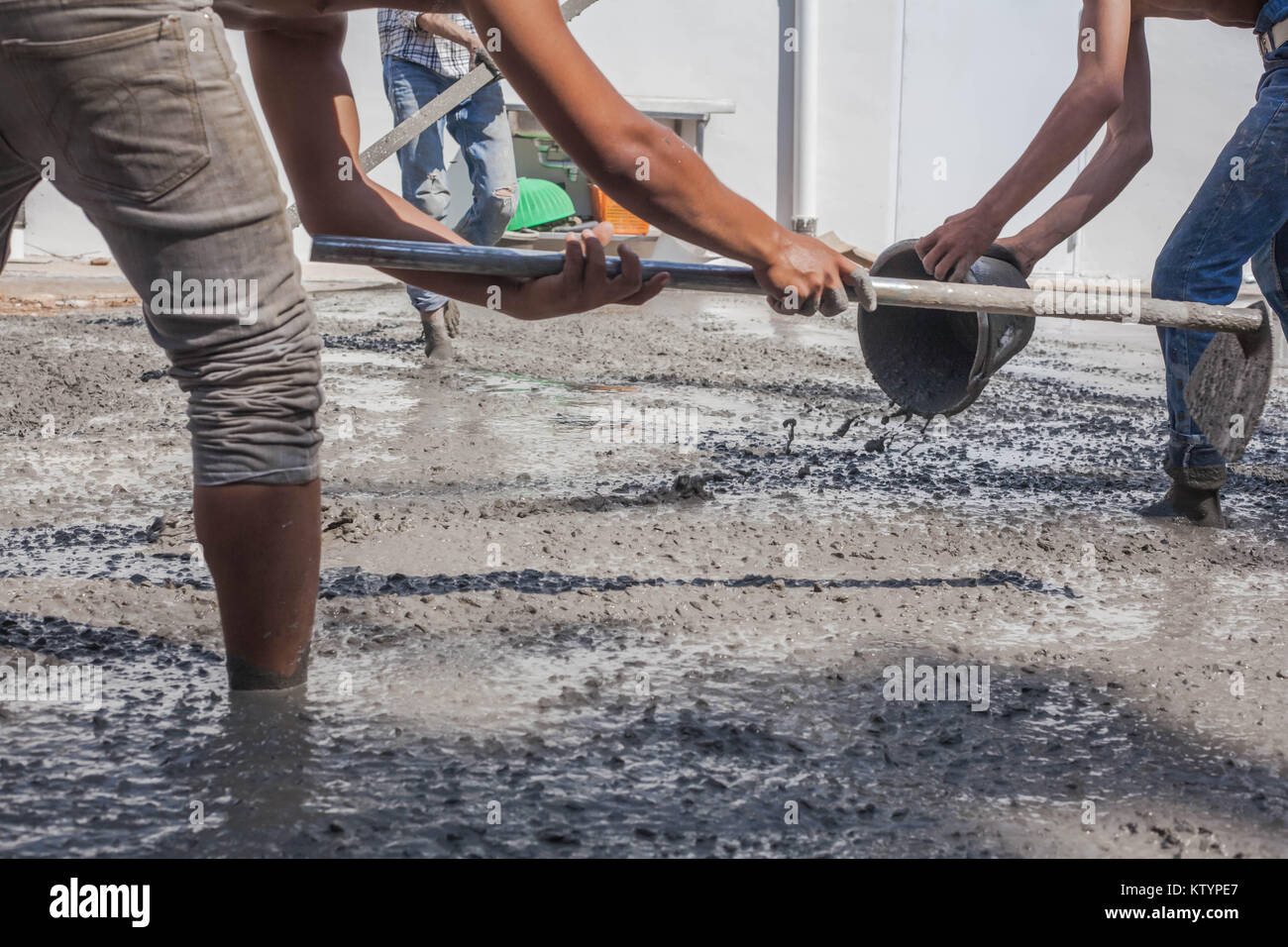 laborers made new construction of street and floor by cement concrete ...