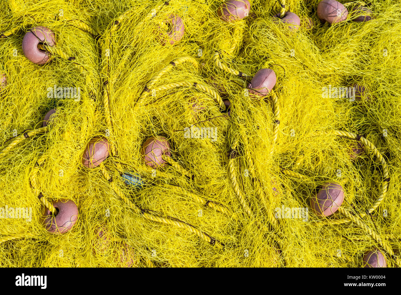 Background of fishing nets and floats Stock Photo - Alamy