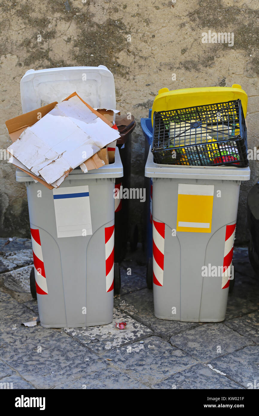 Two wheelie bins and recycle trash cans Stock Photo - Alamy