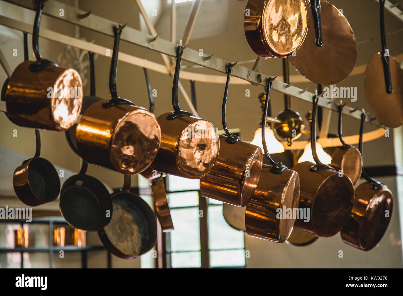 Hanging pans in kitchen hi-res stock photography and images - Alamy