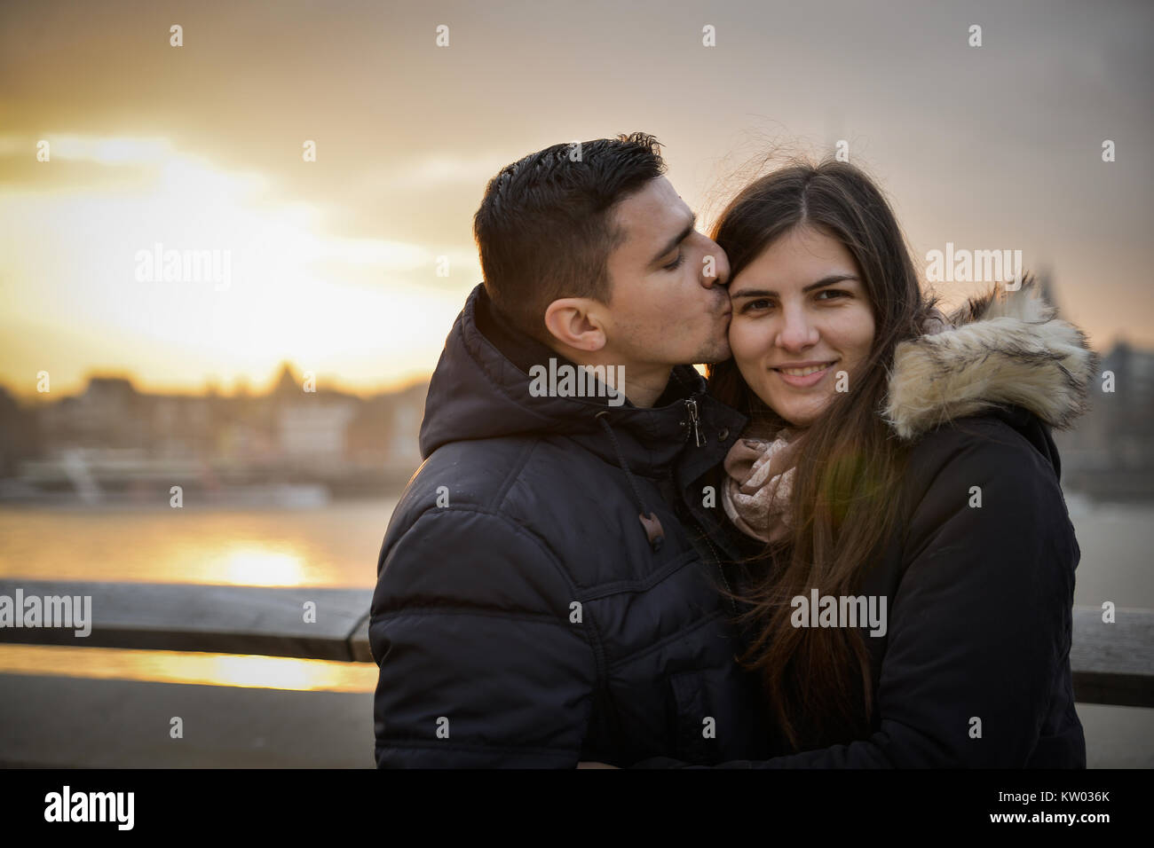 One girl and one boy in Cologne at sunset Stock Photo - Alamy