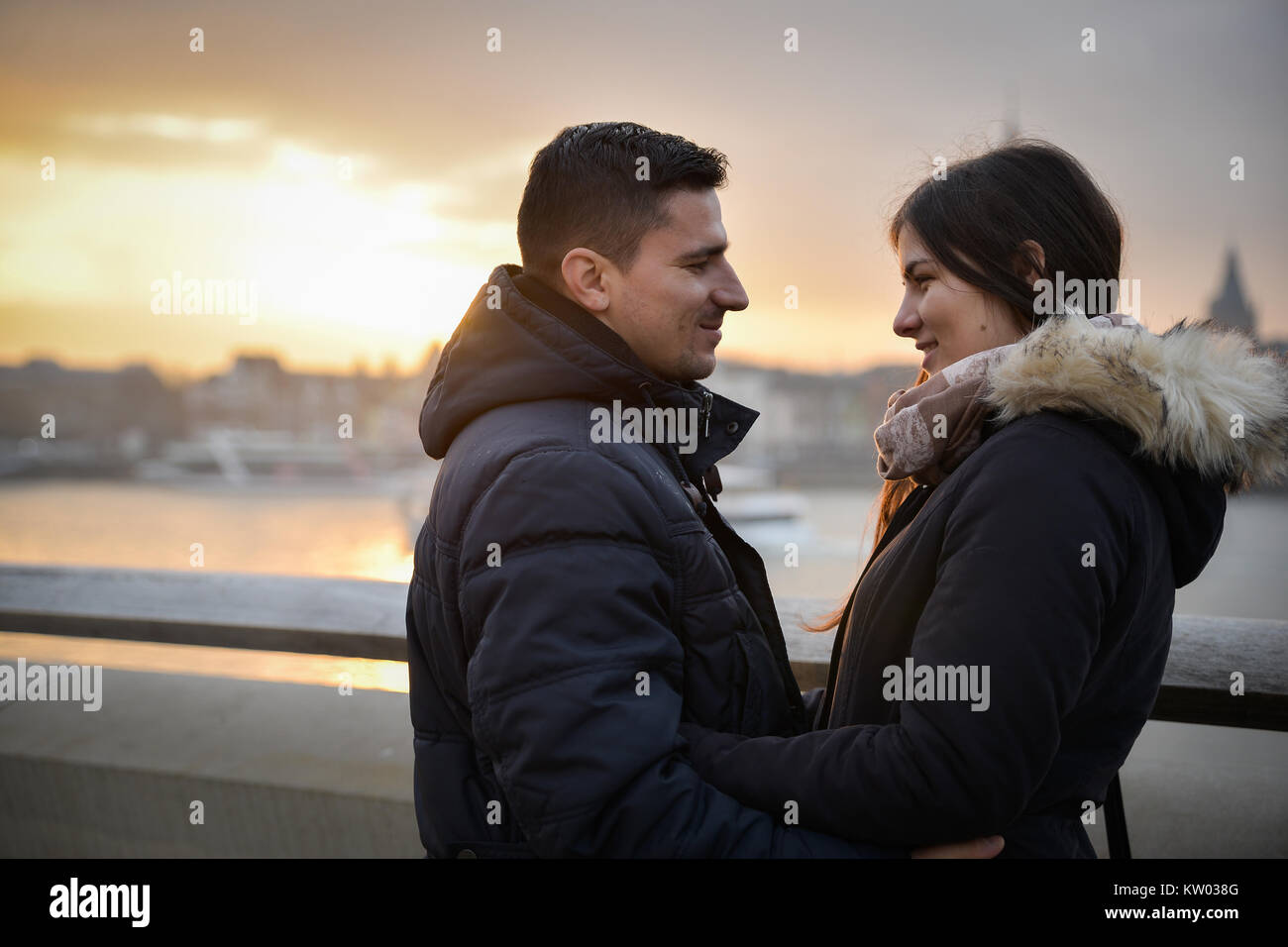 One girl and one boy in Cologne at sunset Stock Photo - Alamy
