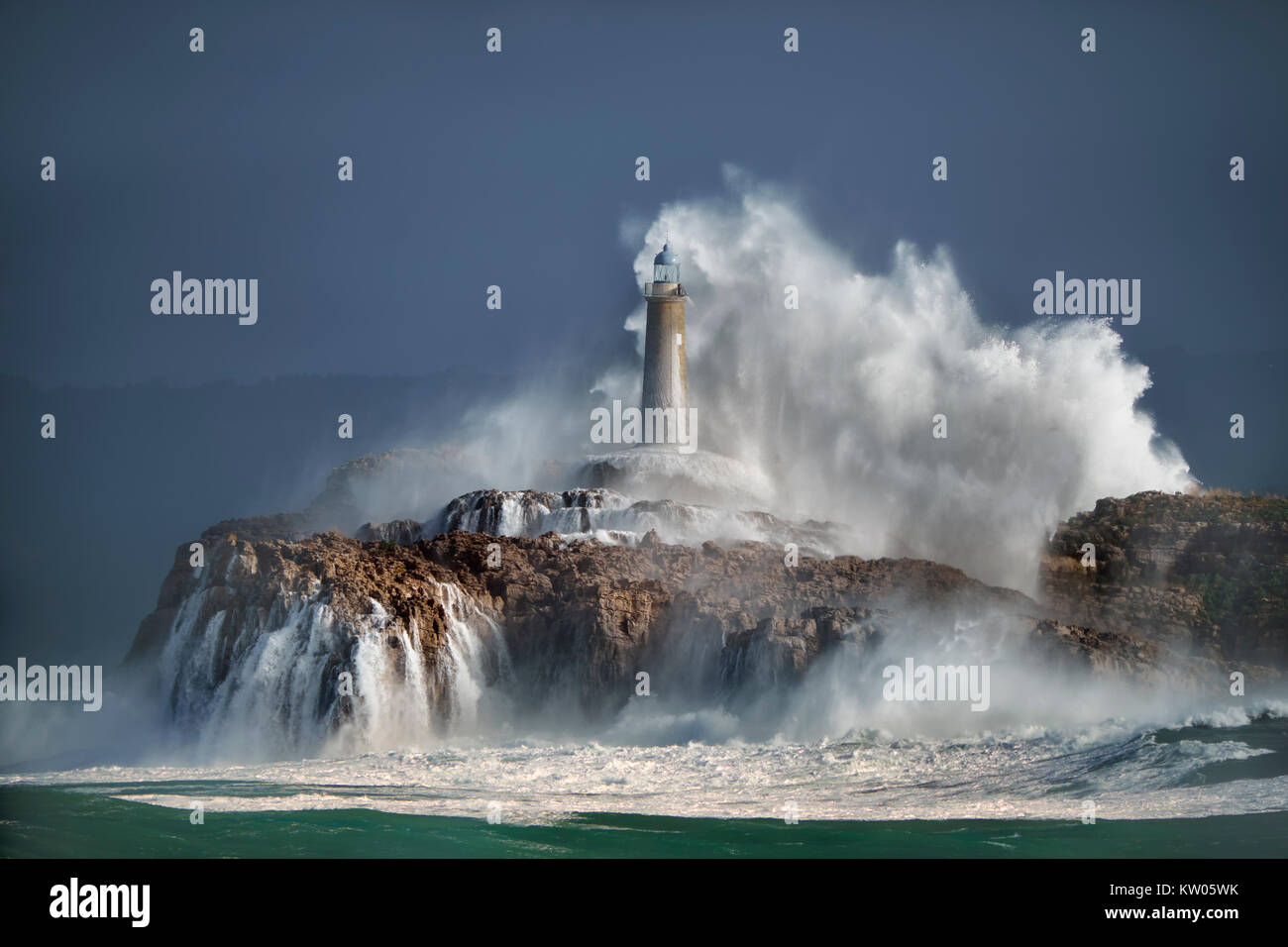 The Mouro island lighthouse during a storm. Big waves, more of 10 ...