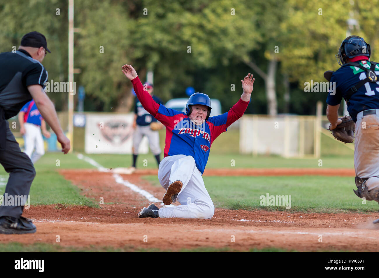 Baseball sliding into home hi-res stock photography and images - Alamy
