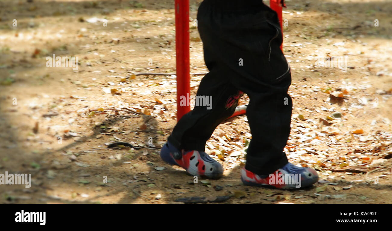 Kids legs feet walking playing hi-res stock photography and images - Alamy