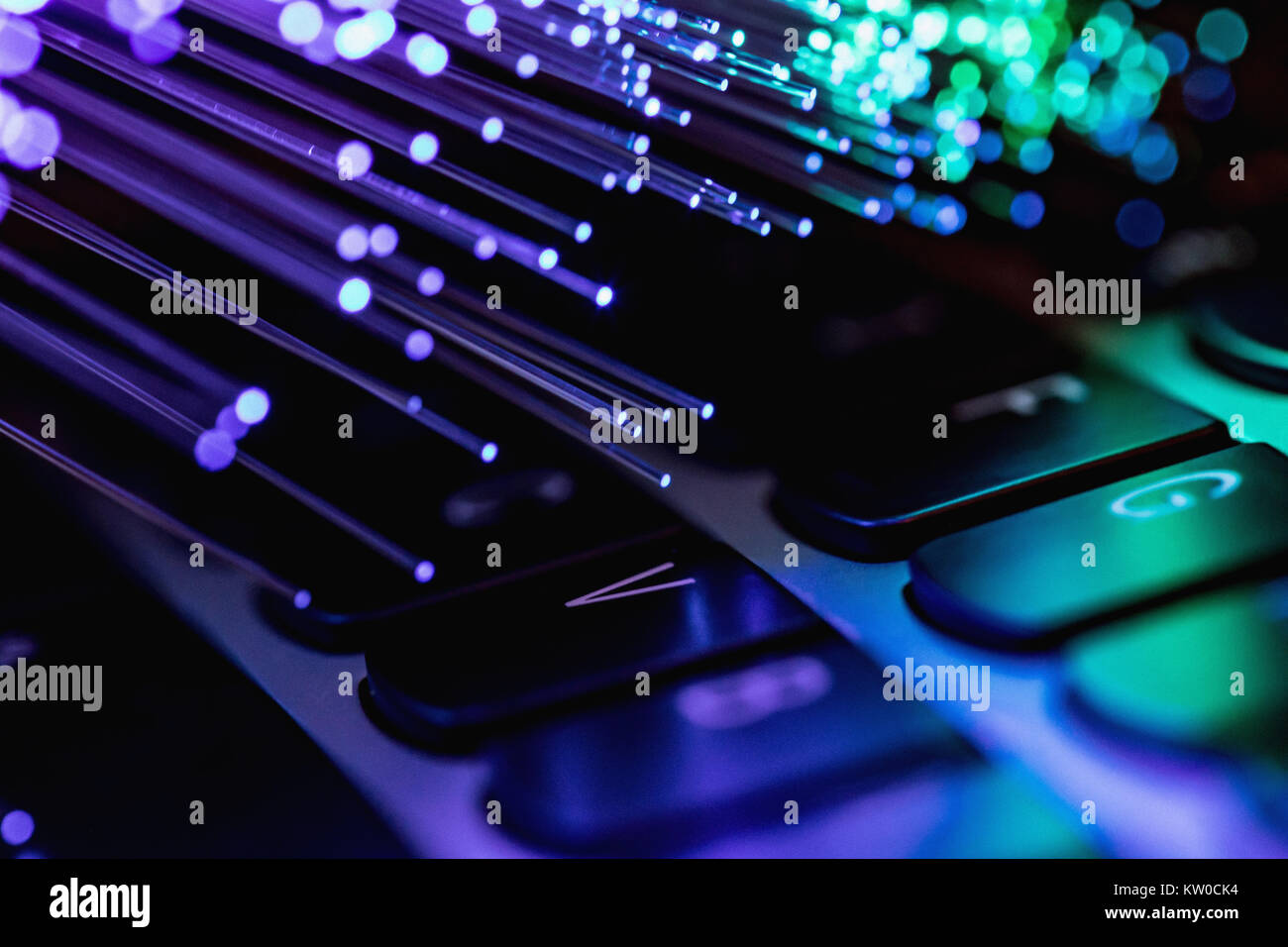 color fiber optical background with notebookk, Fiber optics lights ...