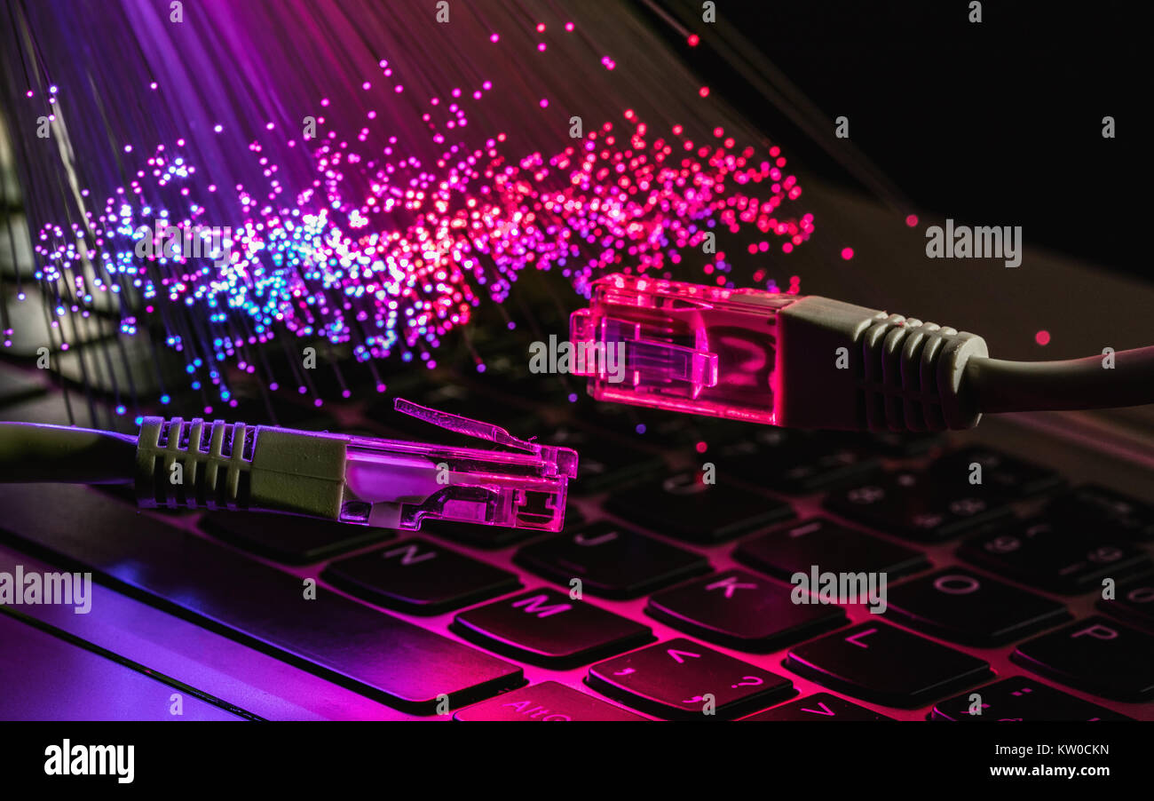 network cable closeup with fiber optical background, color fiber ...
