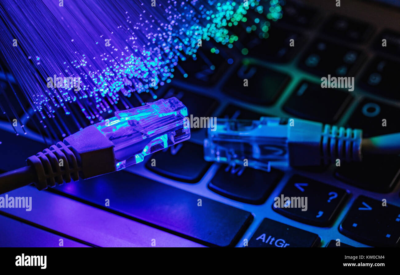 network cable closeup with fiber optical background, color fiber ...