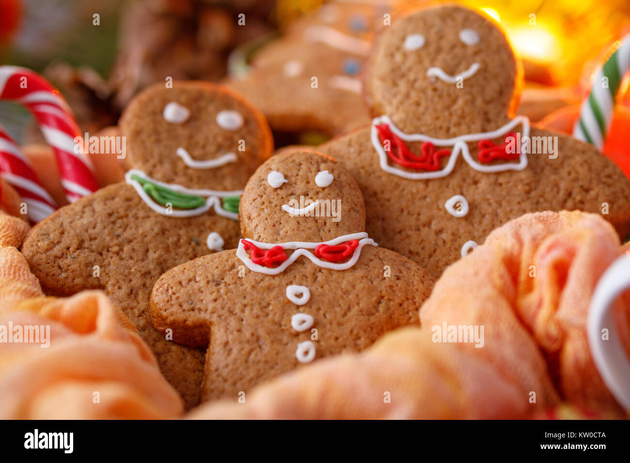 Still life cookies in the form of little people close-up and lollipops ...