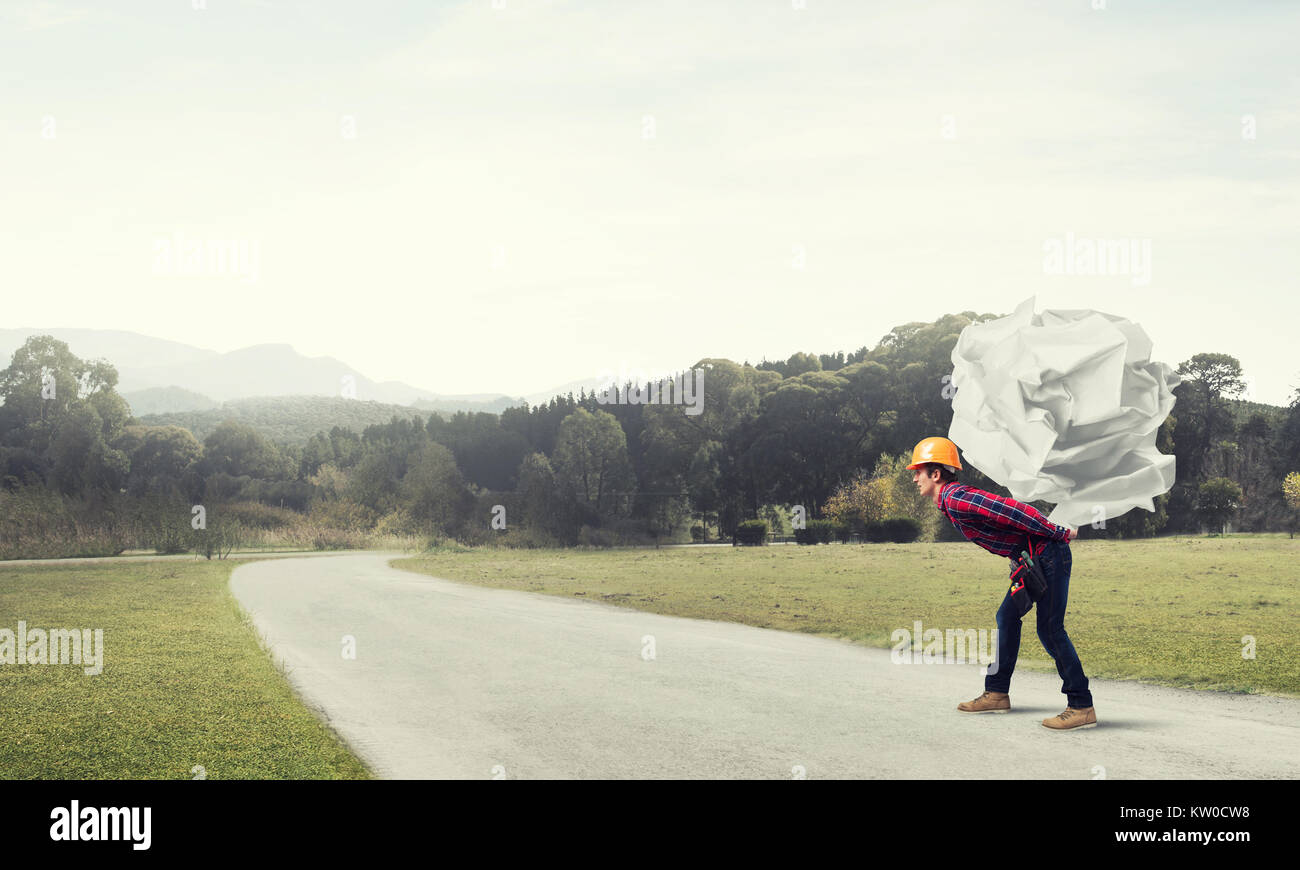 Engineer man carry load Stock Photo - Alamy