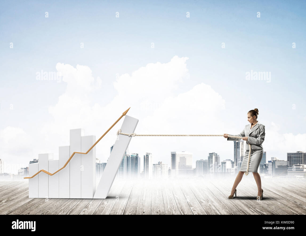 Businesswoman pulling graph with rope as concept of power and control ...