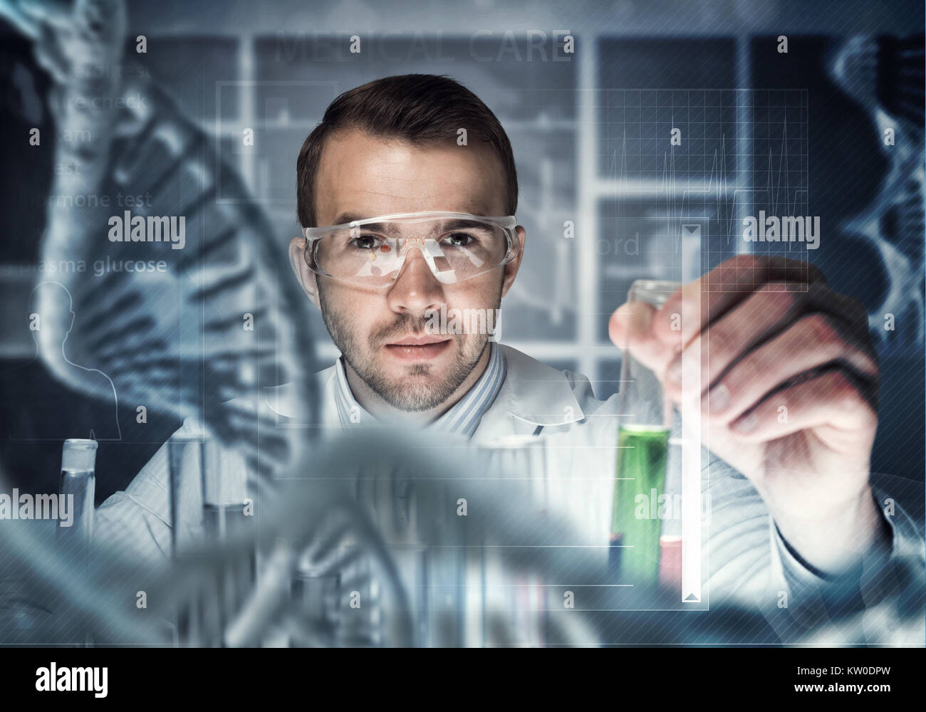 Portrait of concentrated male scientist working with reagents in laboratory Stock Photo - Alamy