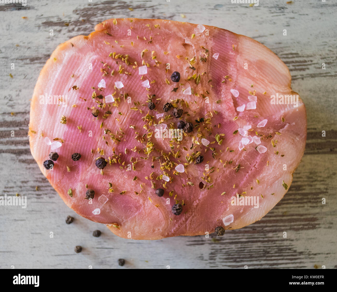 A piece of raw pork beacon with various spices Stock Photo - Alamy