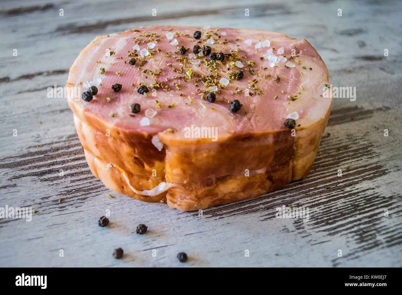 A piece of raw pork beacon with various spices Stock Photo - Alamy