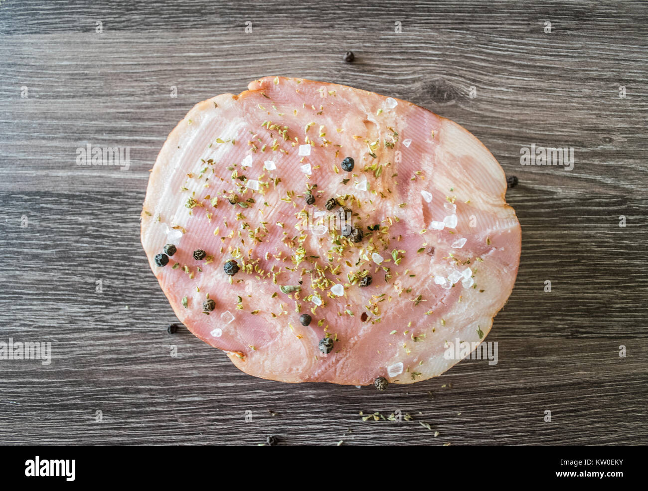 A piece of raw pork beacon with various spices Stock Photo - Alamy