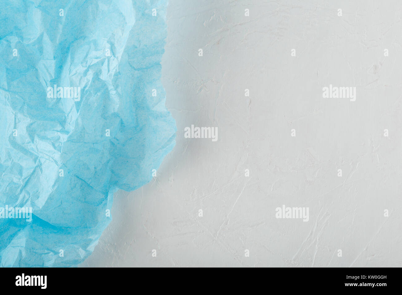 Blue crumpled paper border over white textured background Stock Photo ...
