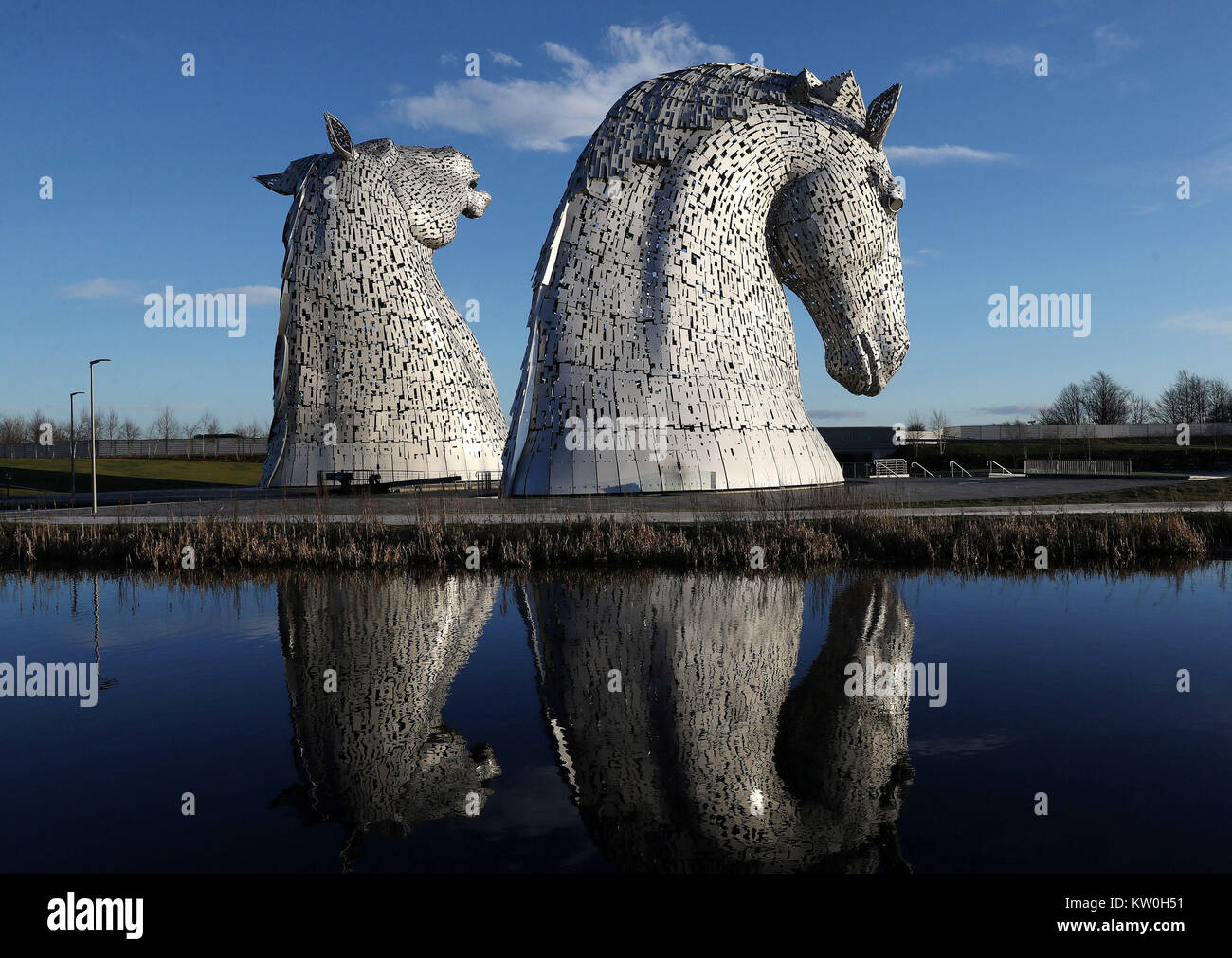 Low winter sunshine at the Kelpies on the Forth and Clyde canal at ...