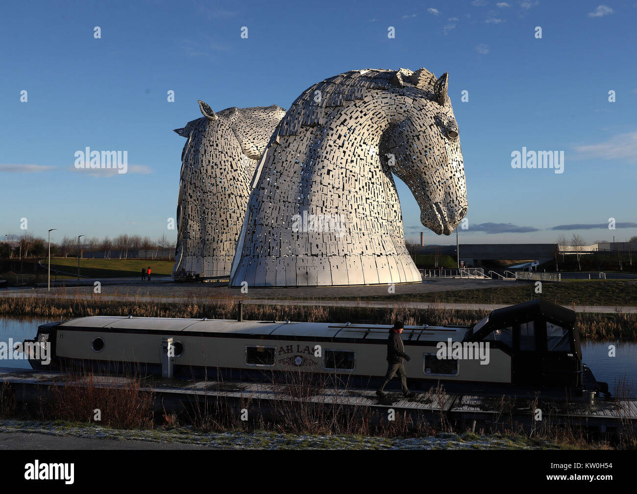 Low winter sunshine at the Kelpies on the Forth and Clyde canal at ...