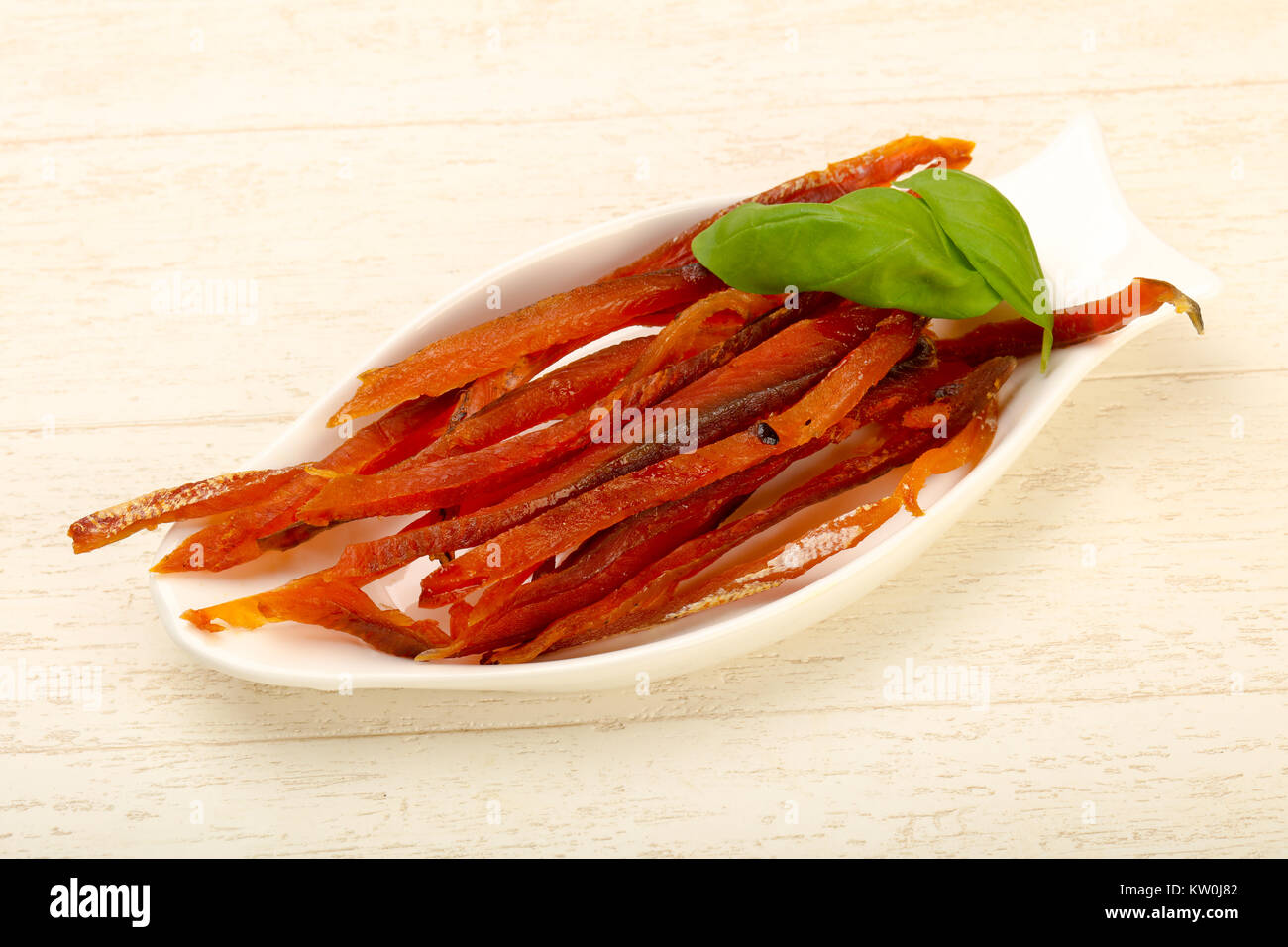 Salmon dry sticks snack Stock Photo - Alamy