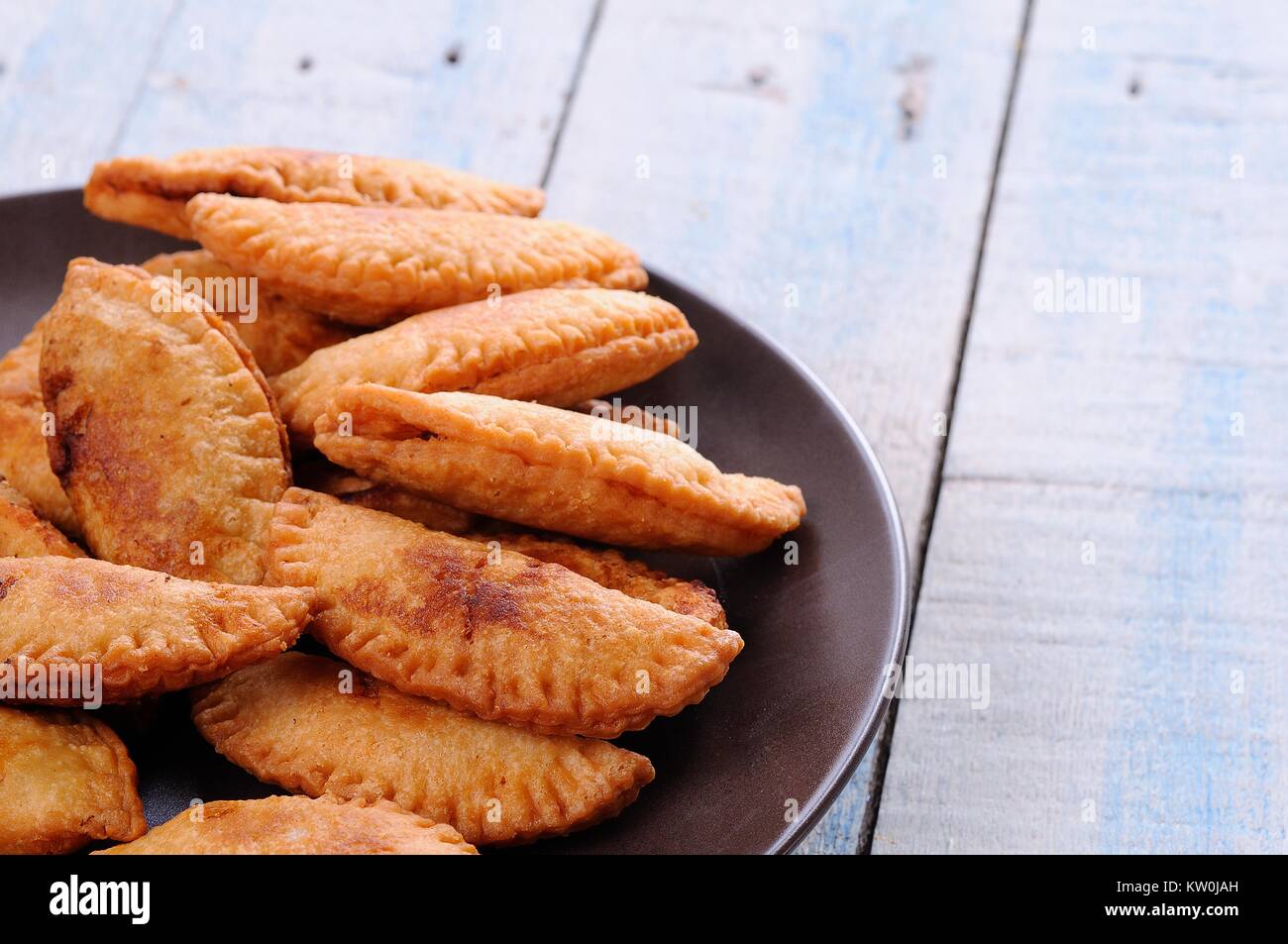 Crusty dumplings on plate Stock Photo - Alamy