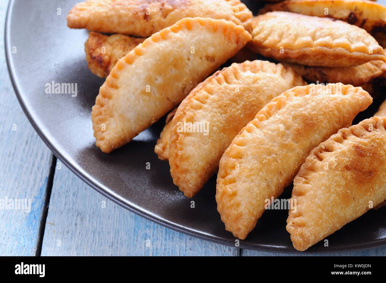 Close-up of crusty dumplings on plate Stock Photo - Alamy