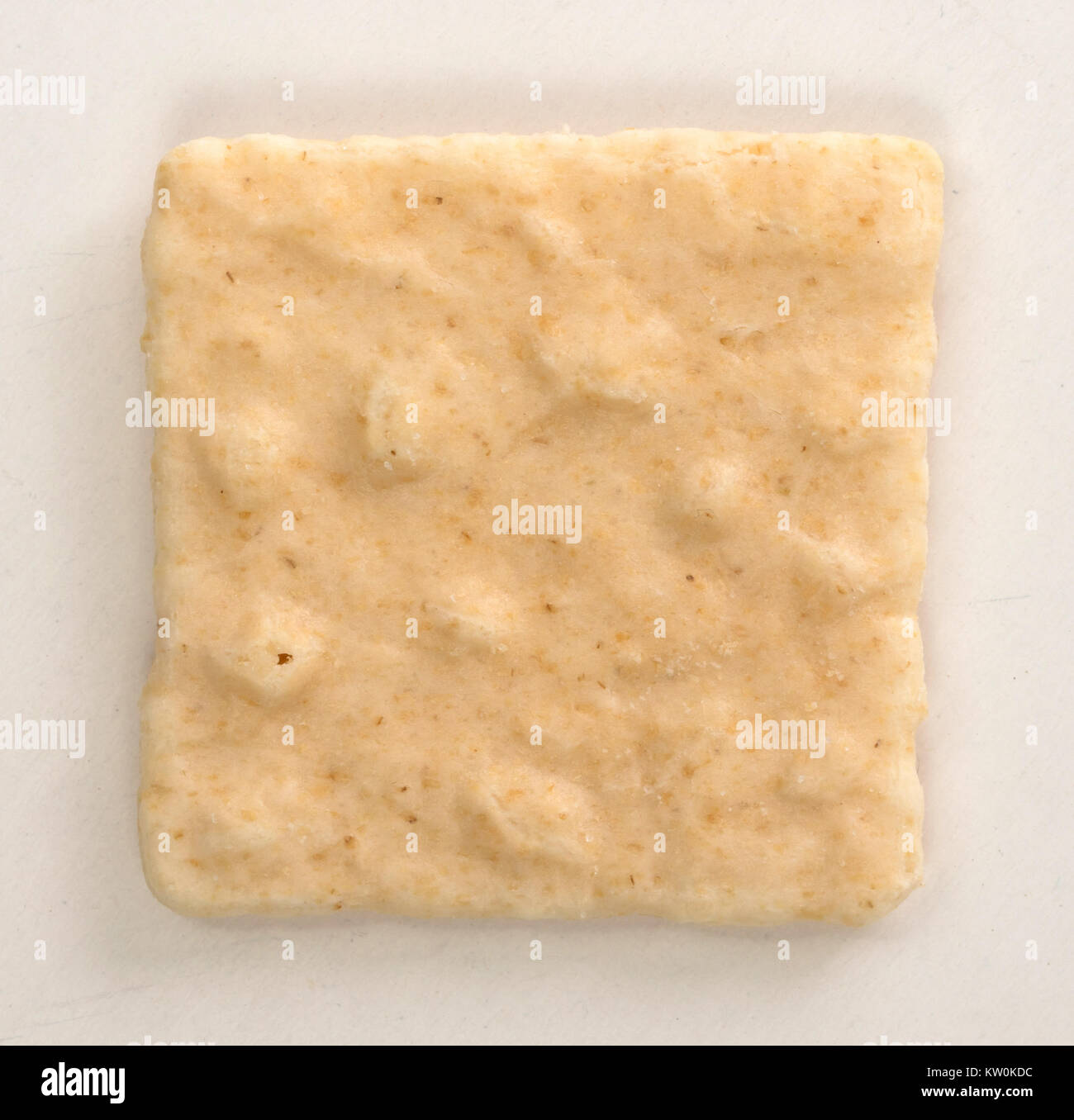 Simple square cracker isolated on a white background Stock Photo - Alamy