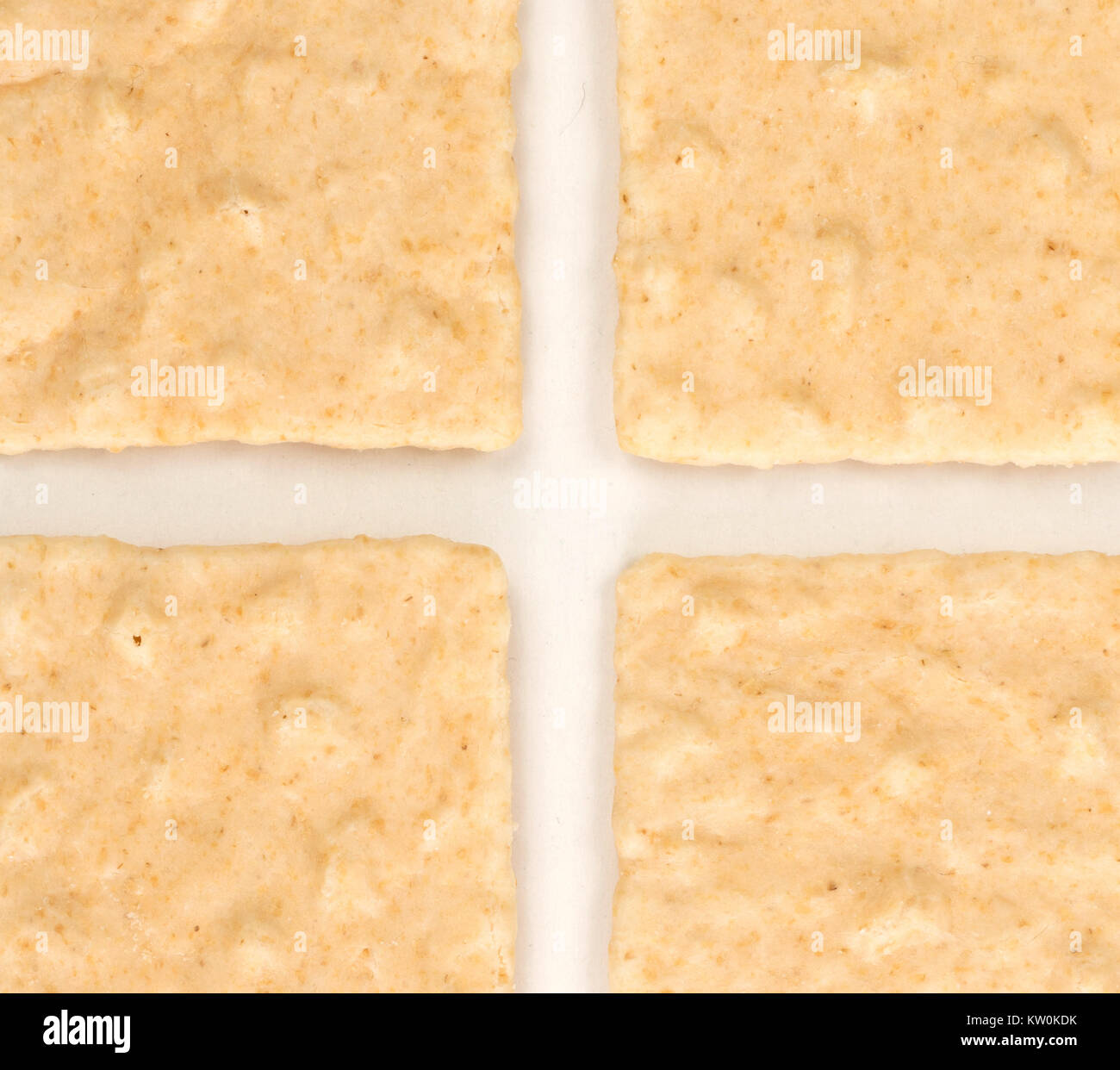 Simple square crackers isolated on a white background Stock Photo - Alamy