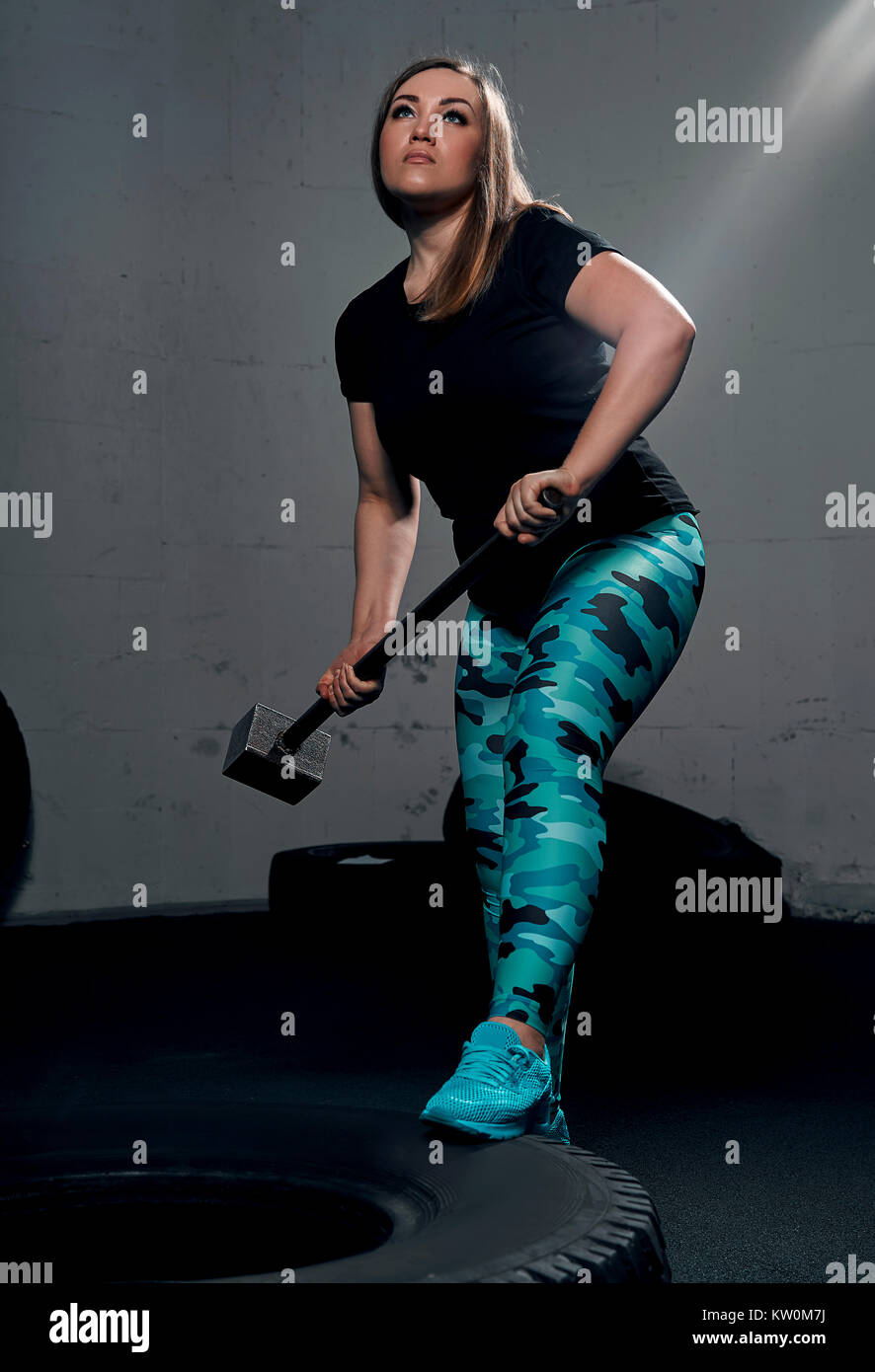 Woman sledge hammer hi-res stock photography and images - Alamy