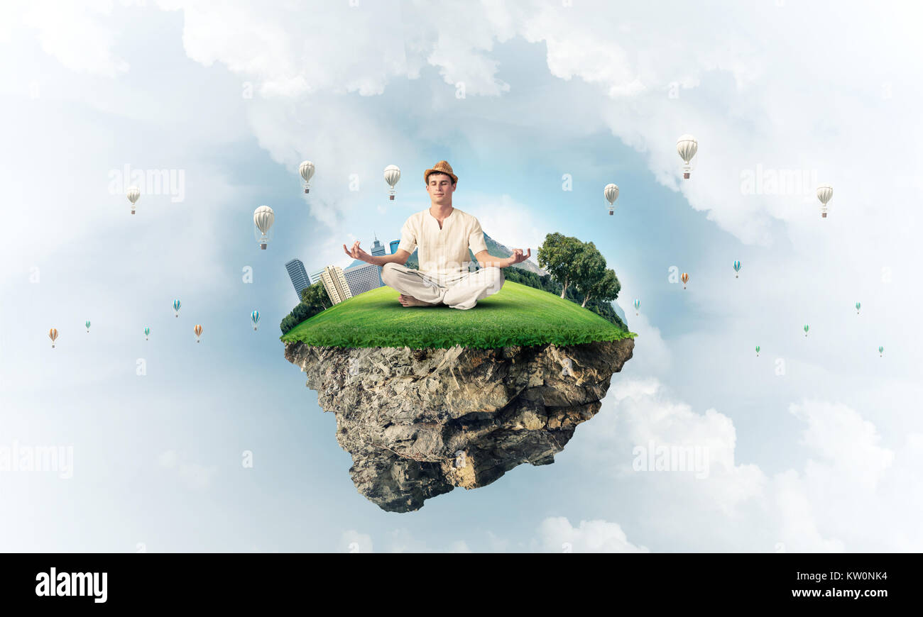 Young man keeping mind conscious Stock Photo - Alamy