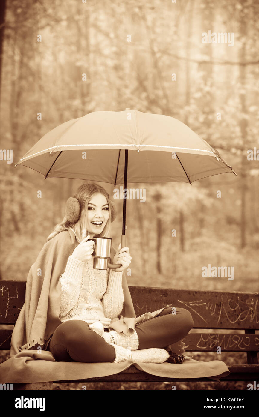 Nature outdoor weather fun cozy concept. Girl sitting in park. Lady ...