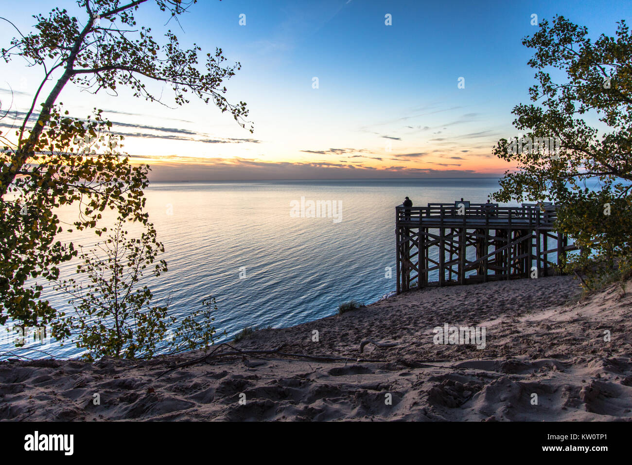 Summer Sunset Over Lake. Massive sand dunes and scenic overlook on Lake ...
