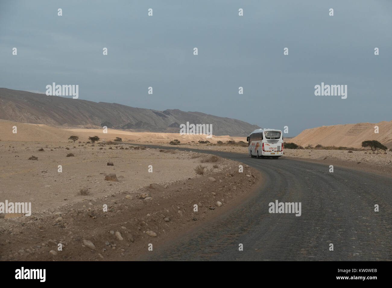 A bus riding through the Arabah valley known in Hebrew as Arava or ...