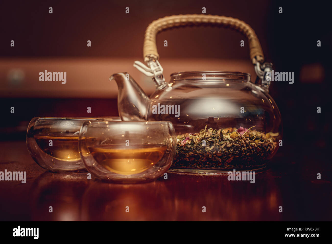 Glass teapot and two cups Stock Photo - Alamy