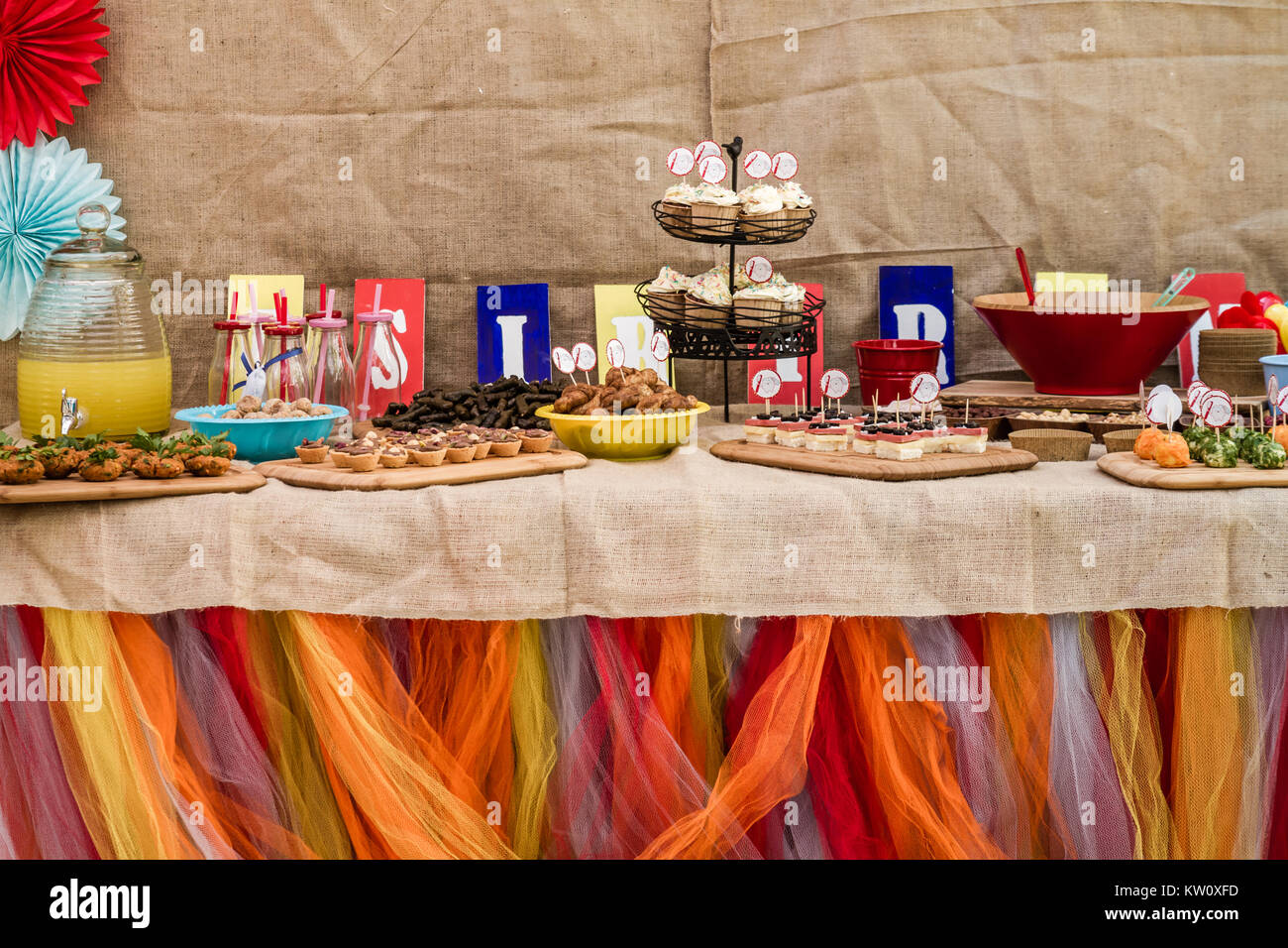Cakes, canapes and cookies on birthday party buffet counter Stock Photo ...