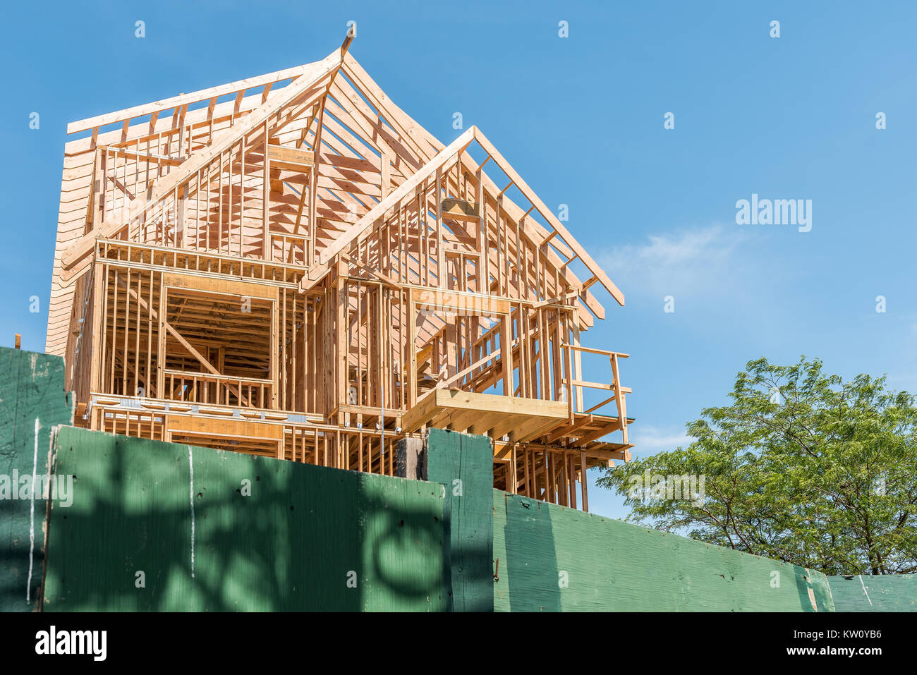 Construction building new modern unfinished townhouses or house with ...